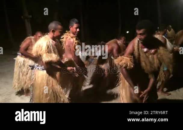 Indigenous Fijian men dancing the traditional meke wesi male dance ...