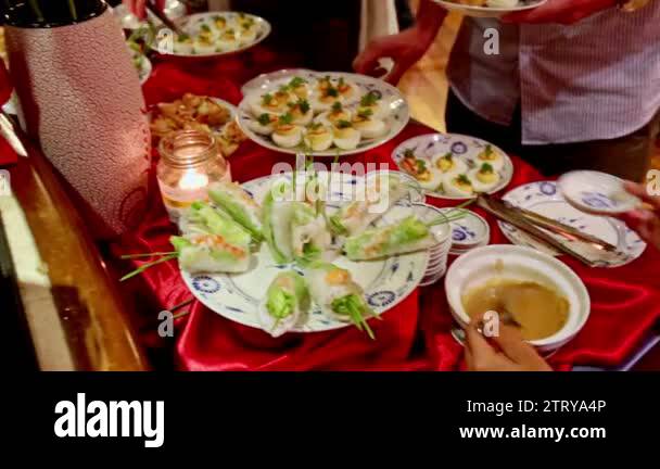 people serve themselves from buffet restaurant table Stock Video ...