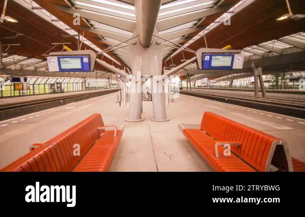 Modern railway platform. Train moving from station. Railway station ...