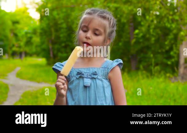 Girl eating popsicle ice cream Stock Videos & Footage - HD and 4K Video ...