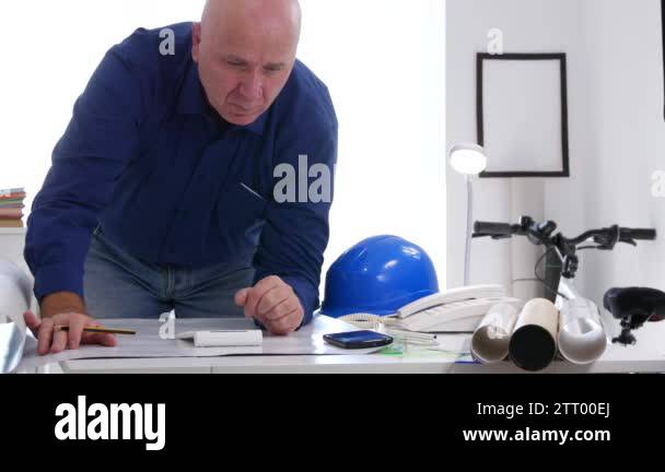 Engineer Make Calculation with Adding Machine and Change the Project ...