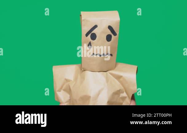 concept of emotion, gestures. a man with a package on his head, with a ...