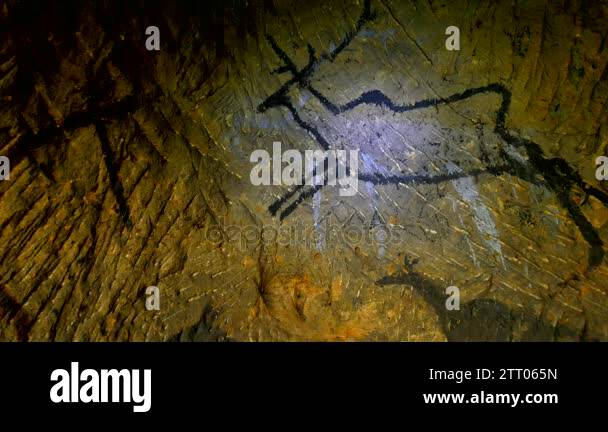 Discovery of prehistoric paint of caveman hunt in sandstone cave. Paint ...