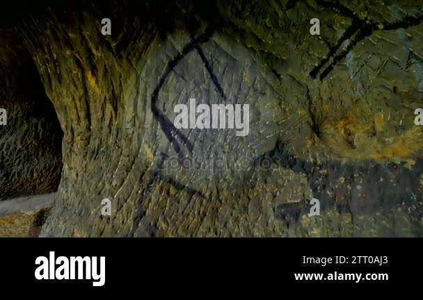 Discovery of prehistoric paint of caveman hunt in sandstone cave. Paint ...