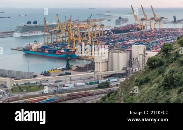 Seaport and loading docks at the port with cranes and multi-colored ...