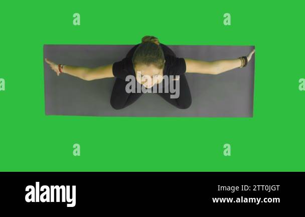 Attractive young woman working out, doing yoga exercise, Sitting in ...