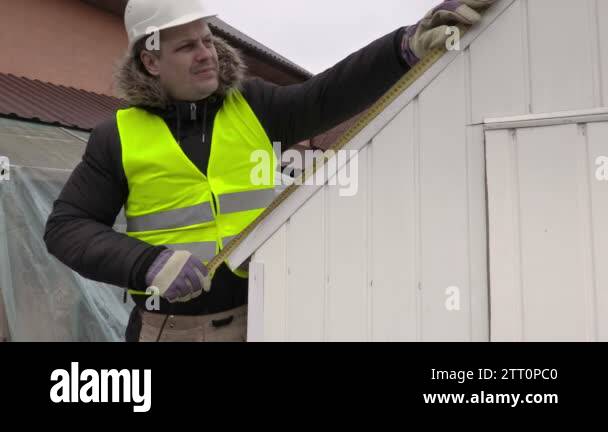 Worker tape measure Stock Videos & Footage - HD and 4K Video Clips - Alamy