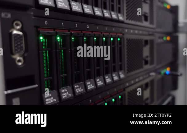 Ethernet Network Connection Hub. Blinking lights in a dark server room, Close-up view of ...