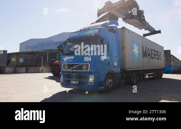 Container Handler is Loading Container onto Truck in Logistic Center ...