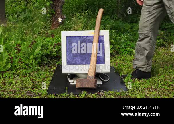 Sledgehammer hit and smash the monitor on the screen. 4K Stock Video ...