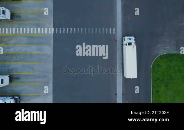 Zoom Out Aerial Shot of Industrial Warehouse/ Storage Building/ Loading ...