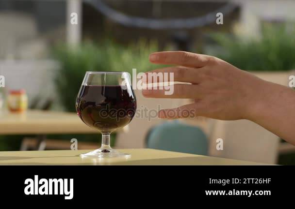 Hand raising a glass Stock Videos & Footage - HD and 4K Video Clips - Alamy