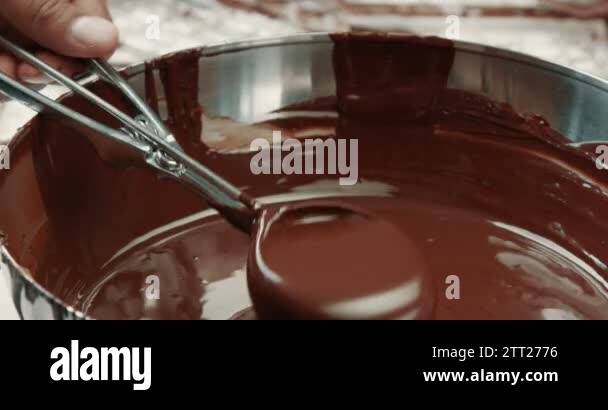 liquid chocolate texture. Process of making a chocolate bars Stock ...