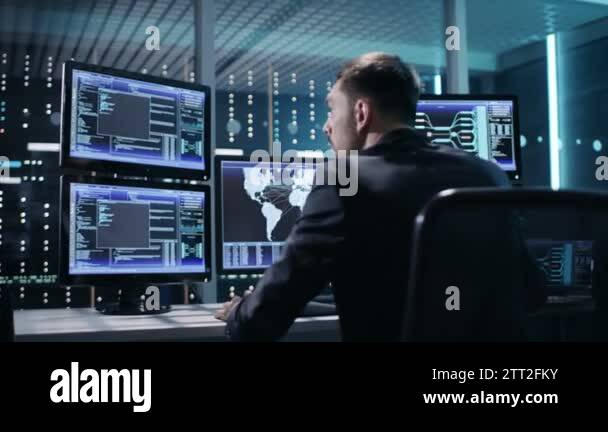 Back View of Technical Controller/ Operator Working at His Workstation ...