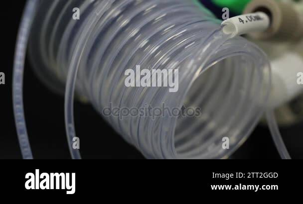 Liquid flows through a transparent pipe. special equipment in the ...