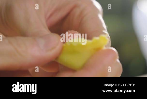 Close-up of a chef preparing ravioli, a typical Italian dish, homemade ...