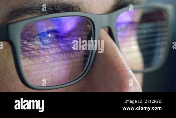 A man watches with a futuristic look with glasses augmented reality in ...