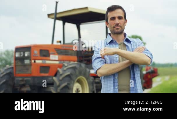 Farmer posing tractor Stock Videos & Footage - HD and 4K Video Clips ...