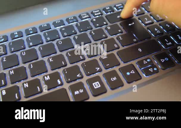 Person using keyboard laptop and pressing backspace key to delete word ...