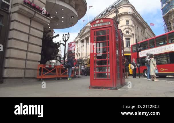 London Street Image with Traditional Phone Booth and Double-Decker Red ...