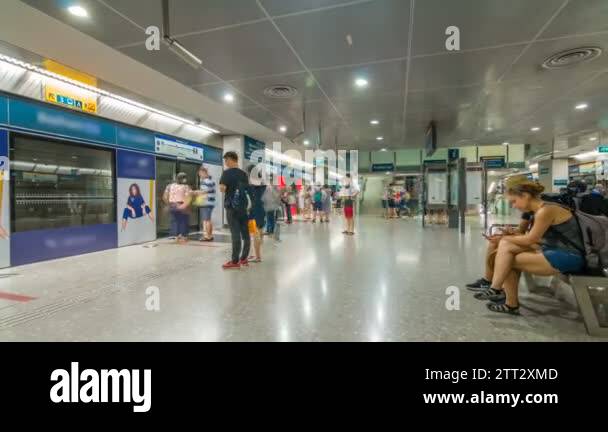 Passengers waiting for metro train in Singapore Mass Rapid Transit MRT timelapse Stock Video ...