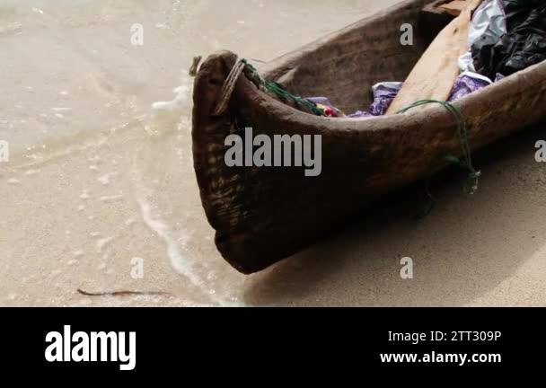 Traditional Indigenous Guna canoe on beach on El Porvenir in the San ...