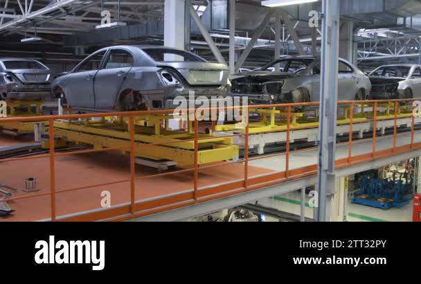 body of car on conveyor Modern Assembly of cars at plant. automated ...