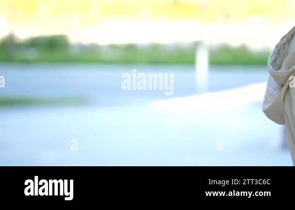 Camera following of woman placing mail in a canadian mail box with 4k ...