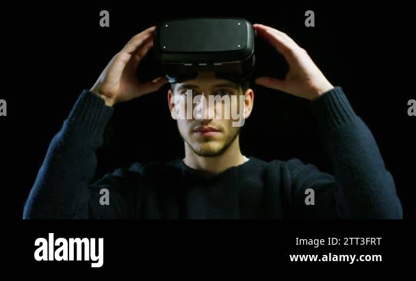 young nice man using 3d reality in life with oculus and augmented ...