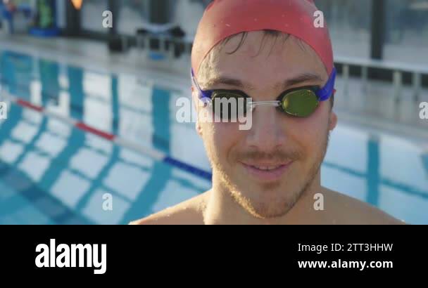 expert swimmer trains at the pool before a race, swimming keeps you fit ...