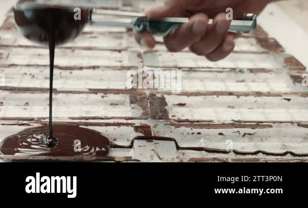 liquid chocolate texture. Process of making a chocolate bars Stock ...