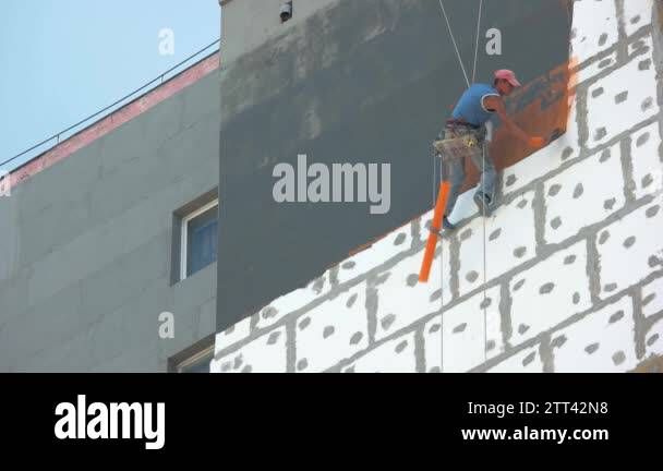 Insulating walls from the outside Stock Video Footage - Alamy
