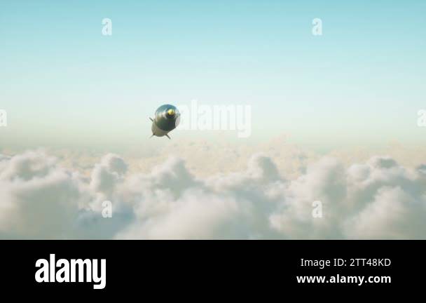 Ballistic nuclear rocket flying over clouds. War and military concept ...