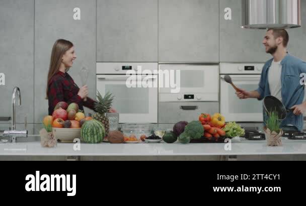 Funny couple in the morning while making breakfast dancing with our ...