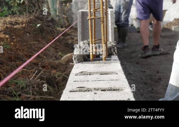 Masons build wall concrete blocks Stock Videos & Footage - HD and 4K ...