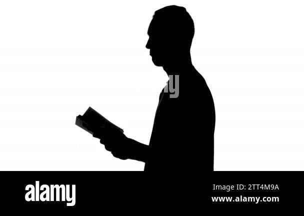 Shadow reading book Stock Videos & Footage - HD and 4K Video Clips - Alamy