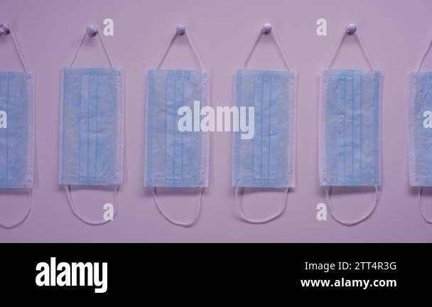 Ear loop masks Stock Videos & Footage - HD and 4K Video Clips - Alamy