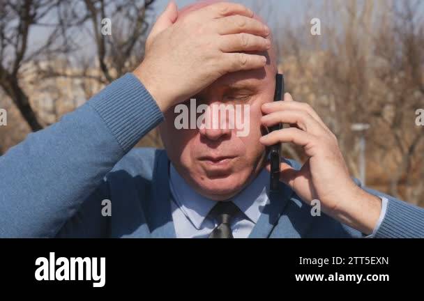 Slow Motion with a Man Talking to Mobile and Make Upset Nervous Hand ...