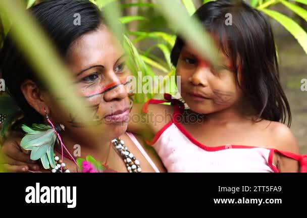 Mother and Daughter at an indigenous tribe in the Amazon Stock Video ...