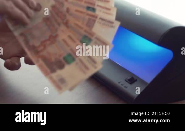 Uv light currency detector Stock Videos & Footage - HD and 4K Video Clips - Alamy