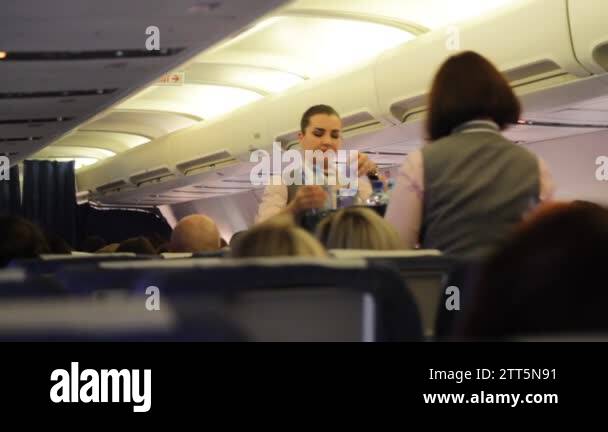 Busy plane cabin Stock Videos & Footage - HD and 4K Video Clips - Alamy