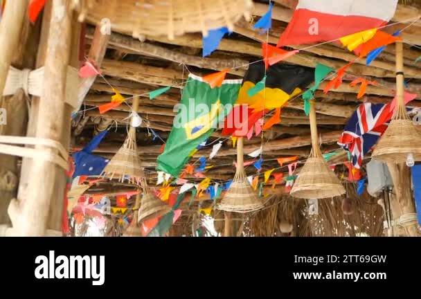 Decorative national flags of different countries hanging on strings in ...