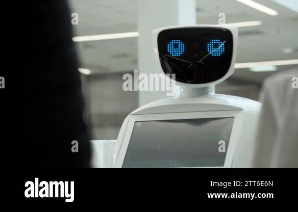 Modern Robotic Technologies. The robot looks at the camera at the ...