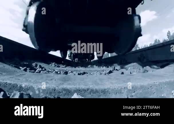 Passing train bottom under view wide angle close-up. Railroad tracks ...