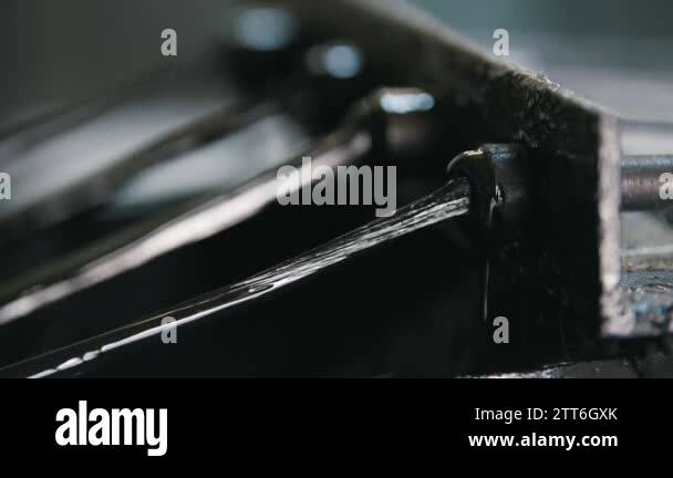 Producing of fiberglass reinforcement - the wire passes through the ...