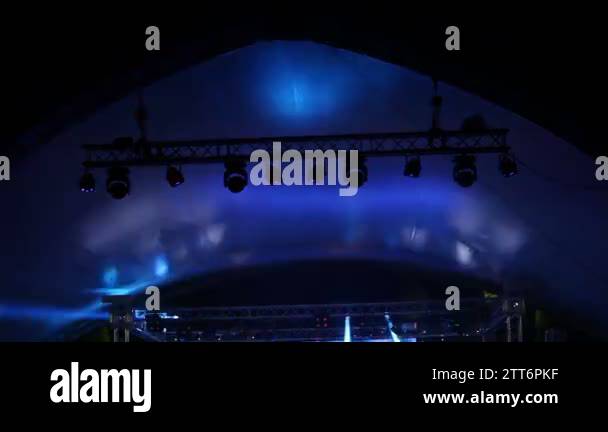 Stage lights at the concert with fog, Stage lights on a console ...