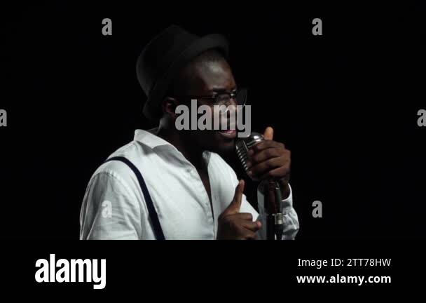 Black rapper holding microphone Stock Videos & Footage - HD and 4K ...