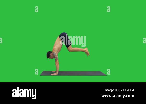 Yoga Dwi Pada Sirsasana feet behind the head pose on a Green Screen ...