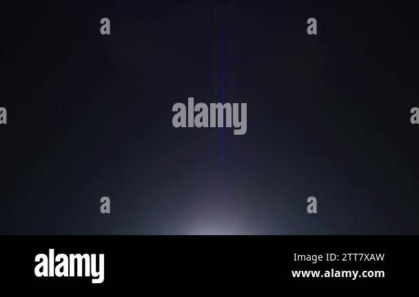 Ascending White Light Makes Colorful Anamorphic Reflection on Screen ...