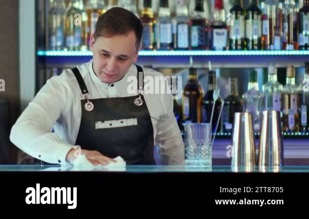 Bartender wiping down bar counter Stock Videos & Footage - HD and 4K ...